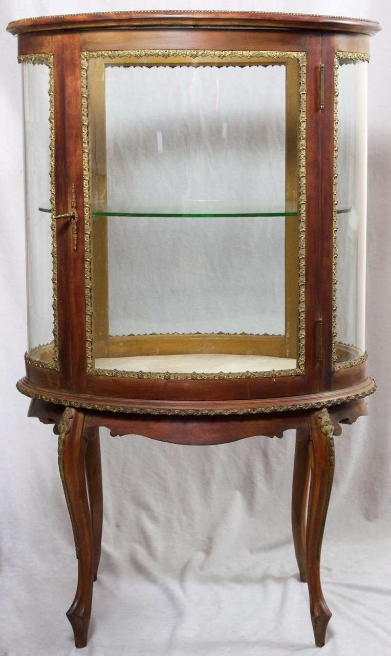 Curved Glass Curio Cabinet at 1stDibs | round curio cabinet, round ...