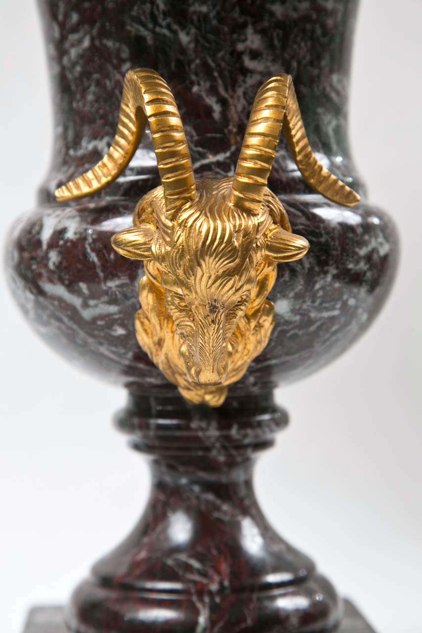 Pair of Marble Urns with Bronze Rams Head Handles at 1stDibs