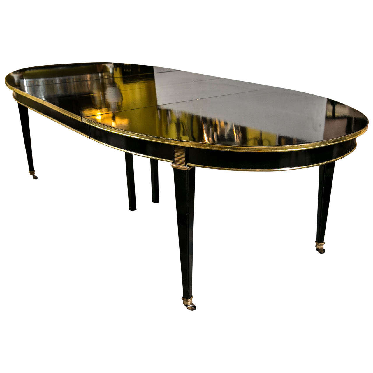 A Maison Jansen Three Leaf Ebonized Dining Table at 1stDibs