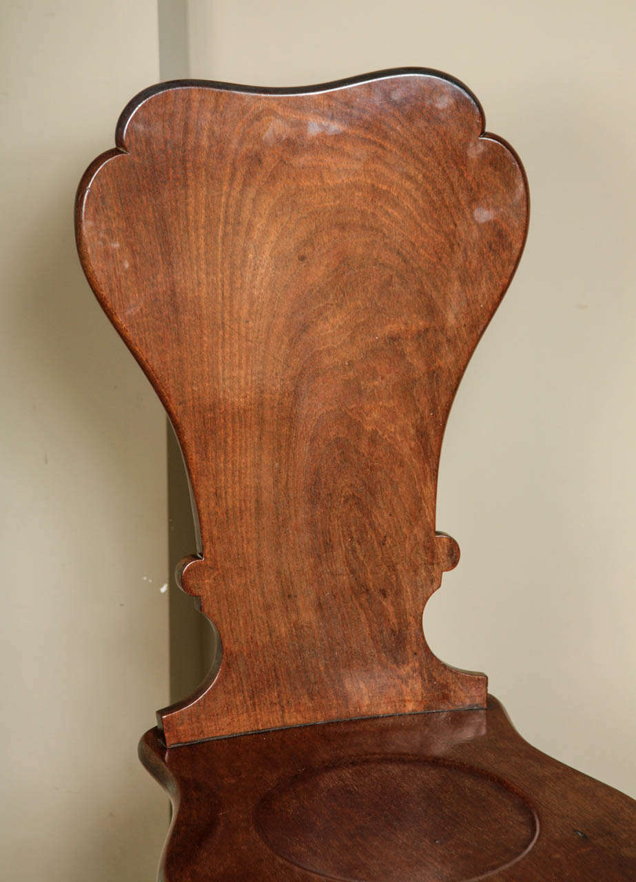 Pair of George II Mahogany Hall Chairs (1740-1760) at 1stDibs