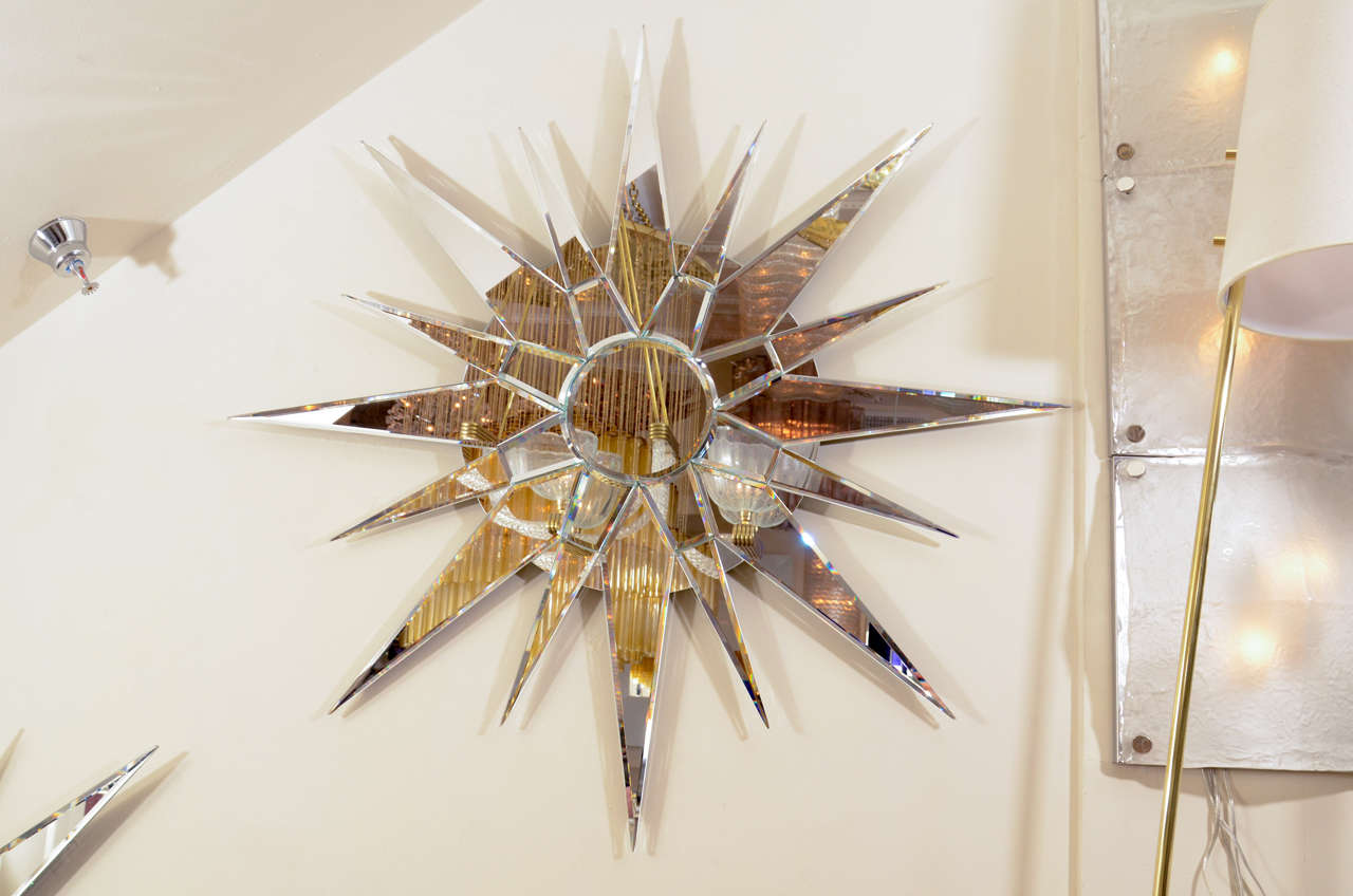 Beveled glass sunburst mirrors at 1stDibs