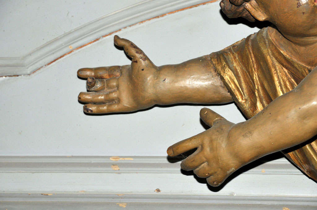 An 18th century French Baroque parcel gilt and polychrome painted ...