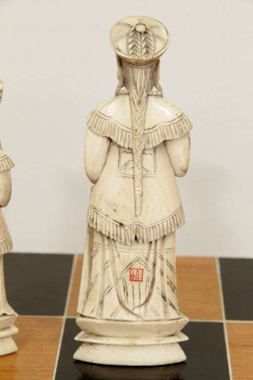 Hand carved ivory chess set at 1stDibs