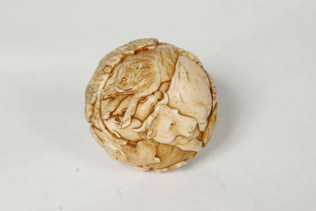 A 19th century Japanese Ivory spherical Okimono. at 1stDibs