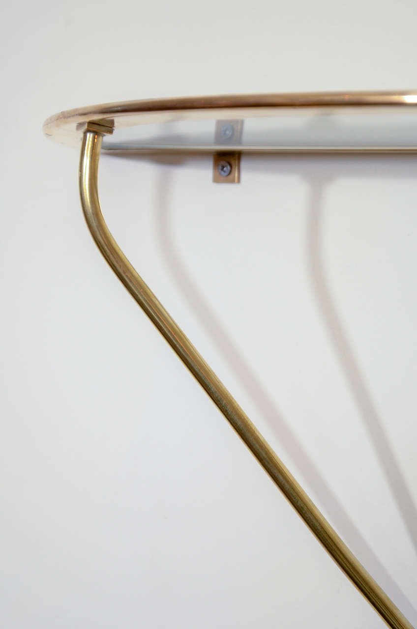 Pair Of Brass Wall Mounted Shelves With Glass Tops at 1stDibs
