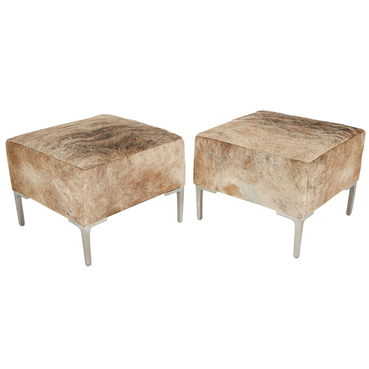 Pair of Cowhide Ottomans at 1stDibs