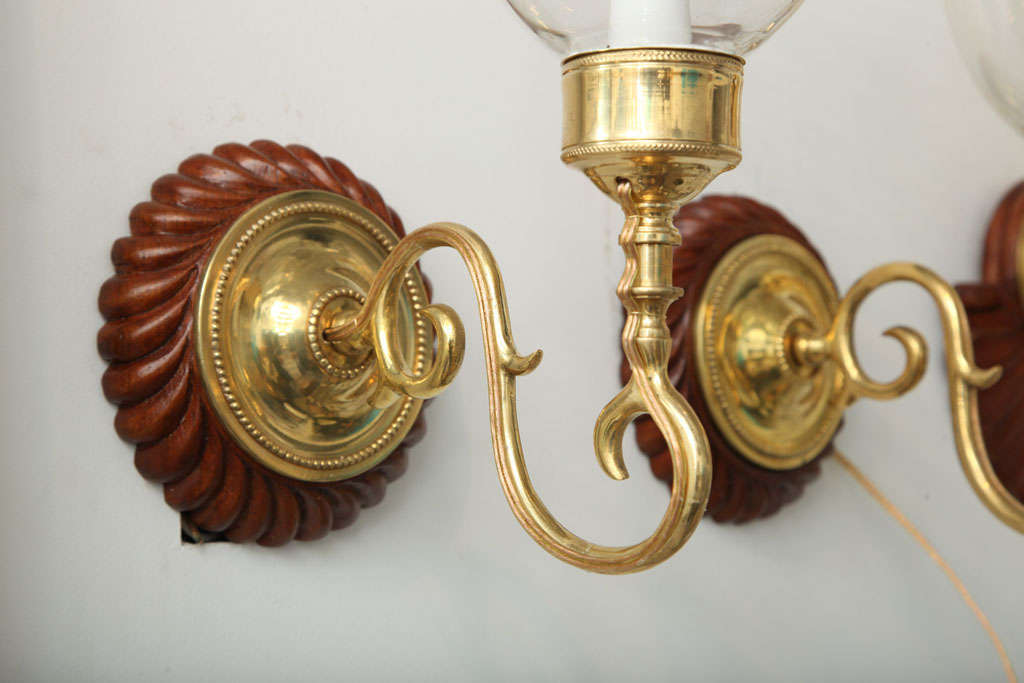 Pair of Carved Wood Backplates with Brass Sconces For Sale at 1stDibs