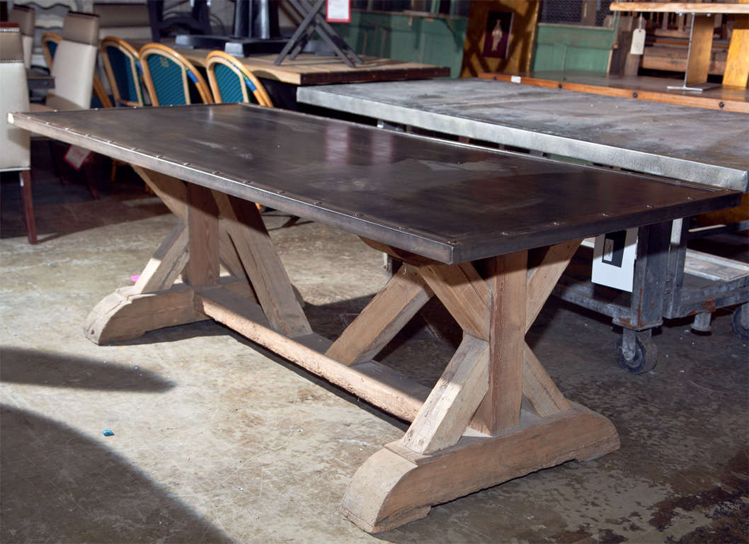 Industrial style steel top dining table at 1stDibs
