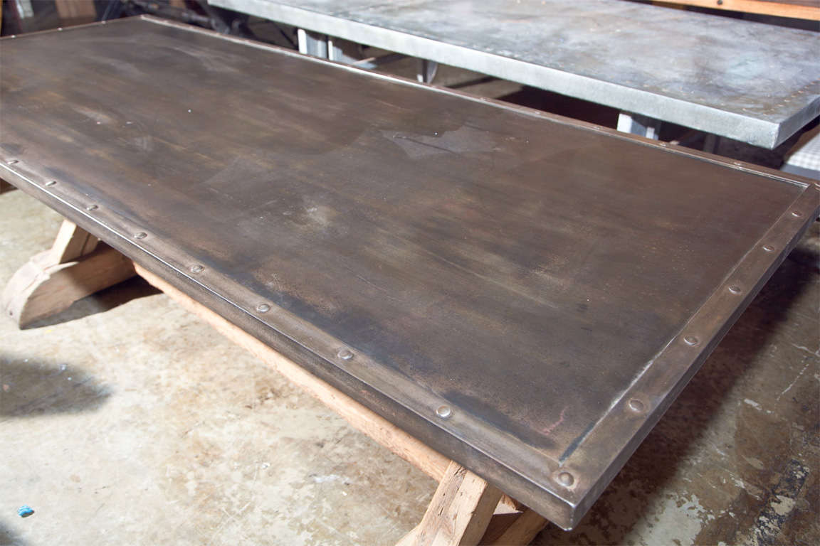 Industrial style steel top dining table at 1stDibs