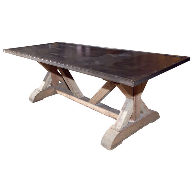 Industrial style steel top dining table at 1stDibs