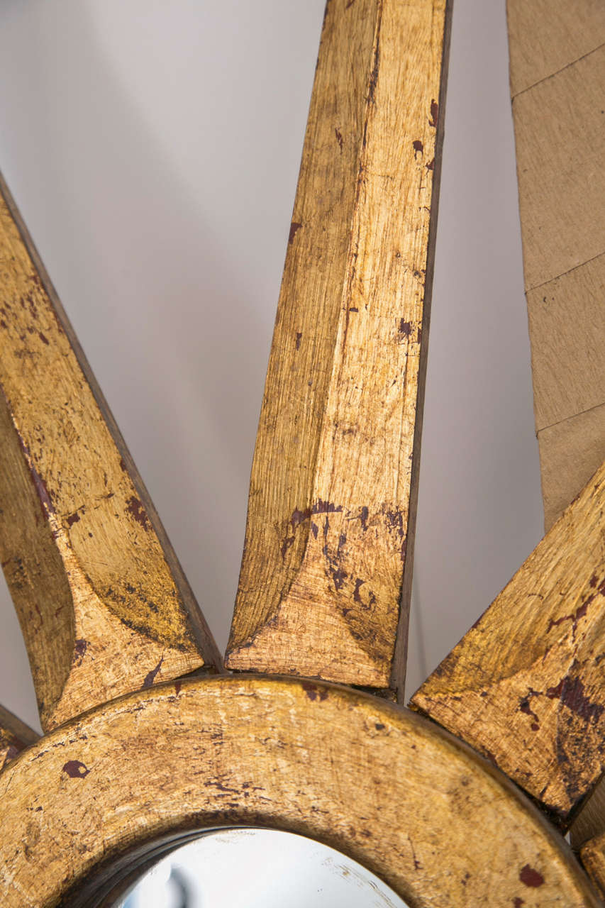 A Large French Gilt Wood Starburst Mirror at 1stDibs
