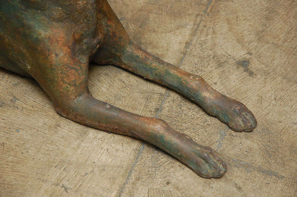 Iron Reclining Dog at 1stDibs