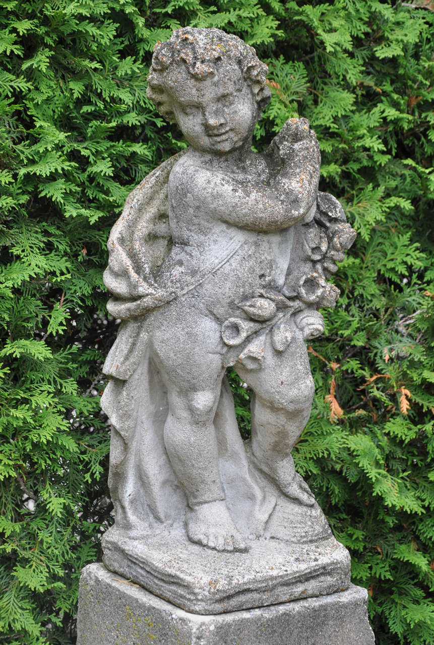 French Cast Stone Cherub Statue on Pedestal, Early 20th Century at 1stDibs