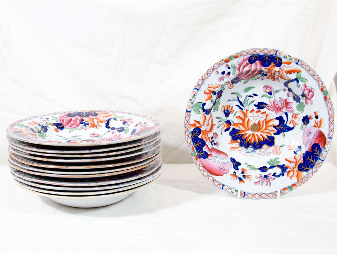 A Set of Dishes: A Dozen English Imari Ironstone "Lotus" Pattern Soup ...
