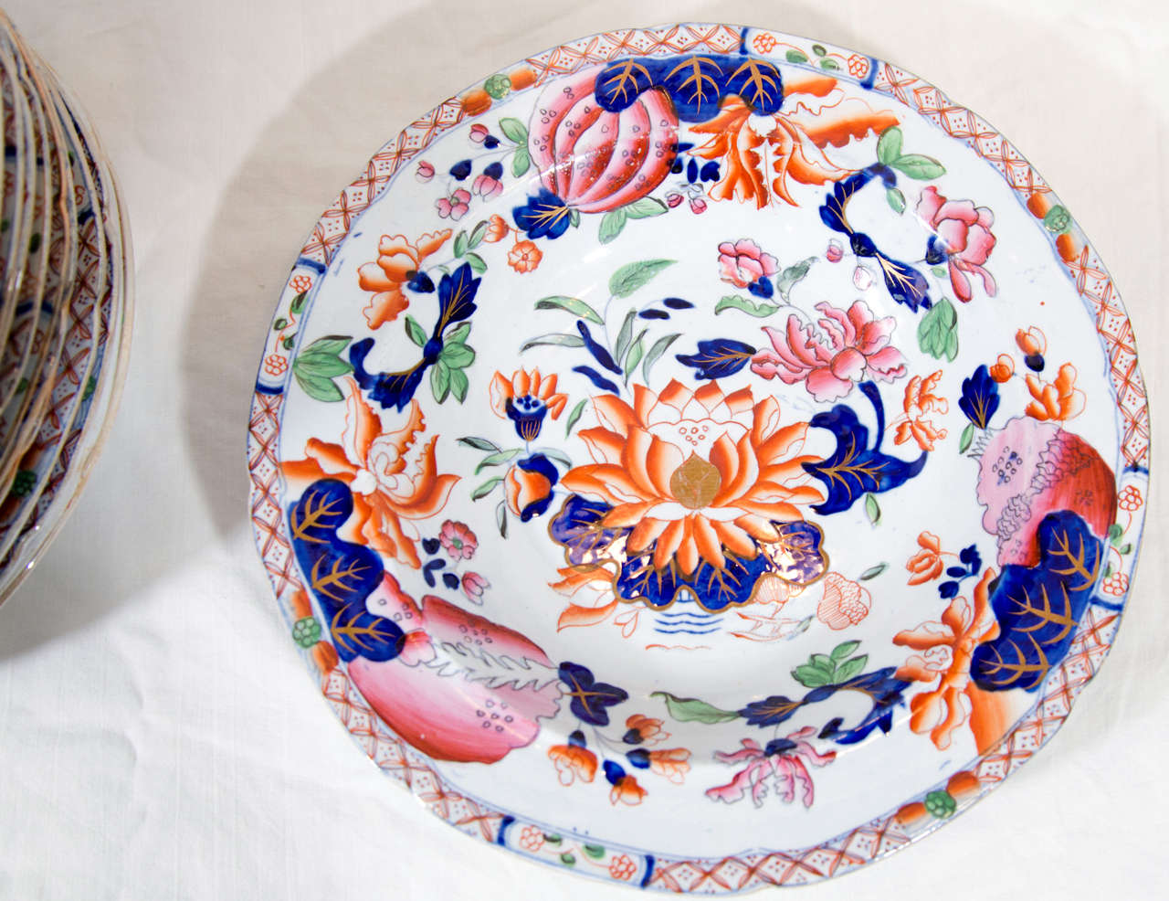 A Set of Dishes: A Dozen English Imari Ironstone "Lotus" Pattern Soup ...