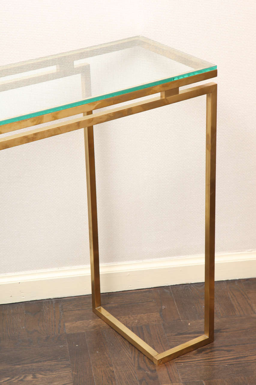 A Geometric Brass and Glass Topped Console Table, France c. 1970 at 1stDibs