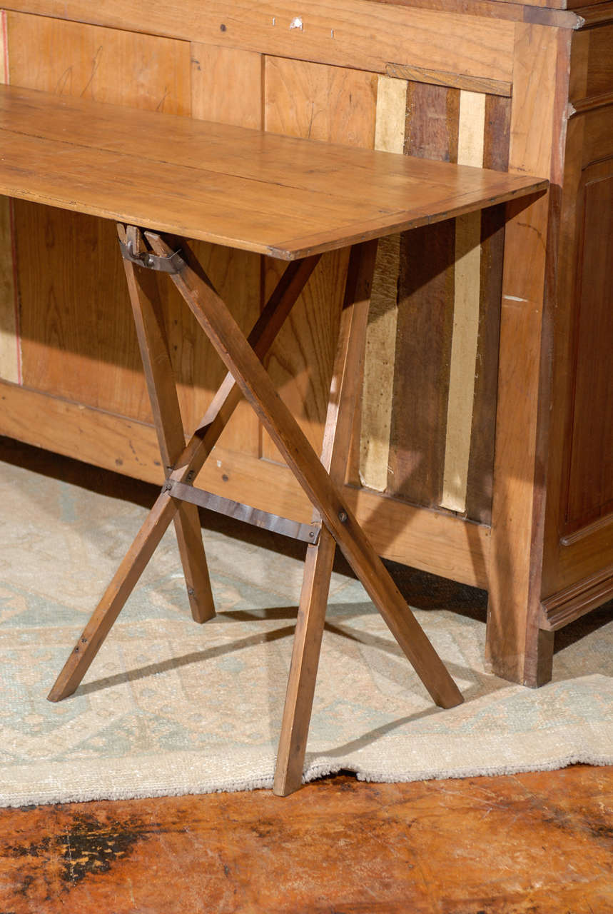 Unusual folding campaign console table. at 1stDibs