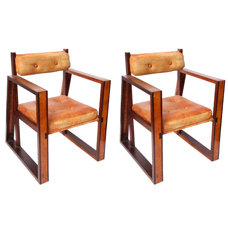 A Pair of 1970's Modernist wood and leather Arm Chairs at 1stDibs