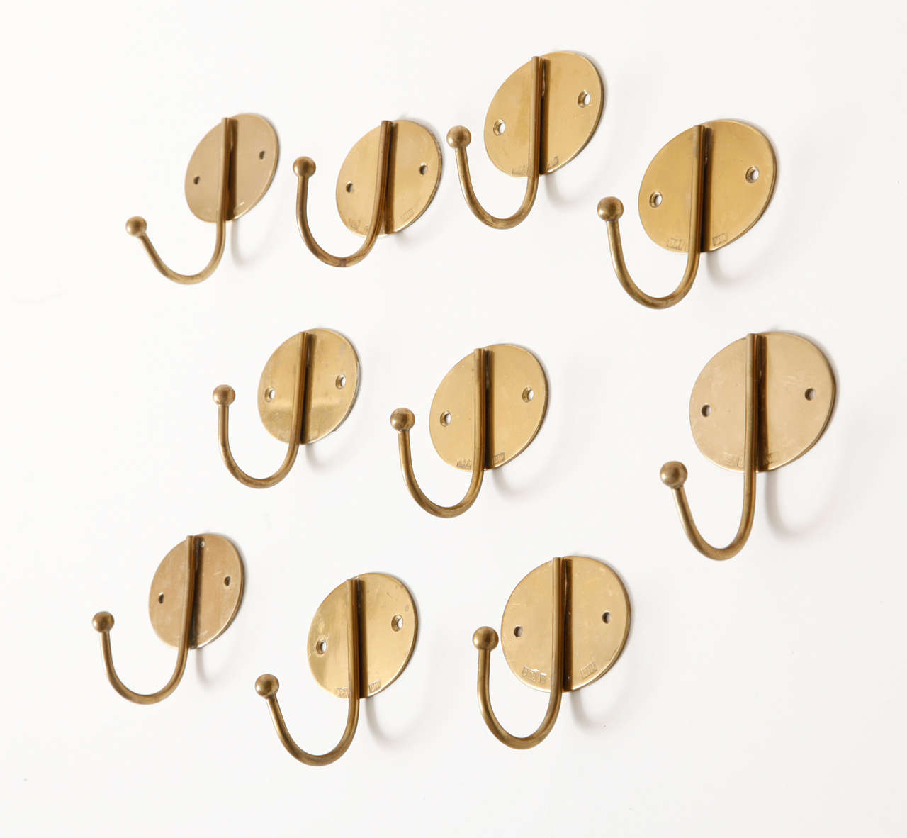 Set of Ten Brass Hooks at 1stDibs