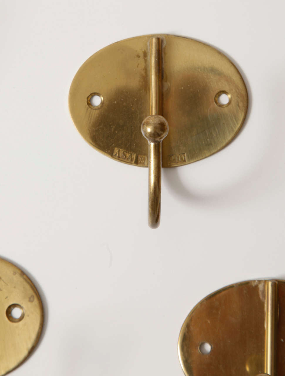 Set of Ten Brass Hooks at 1stDibs