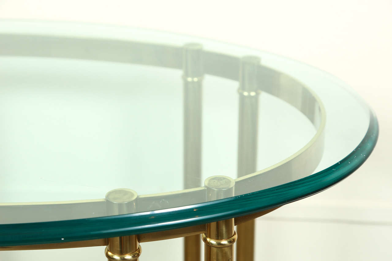 Pair of Stylish Brass and Glass Oval Side Tables at 1stDibs