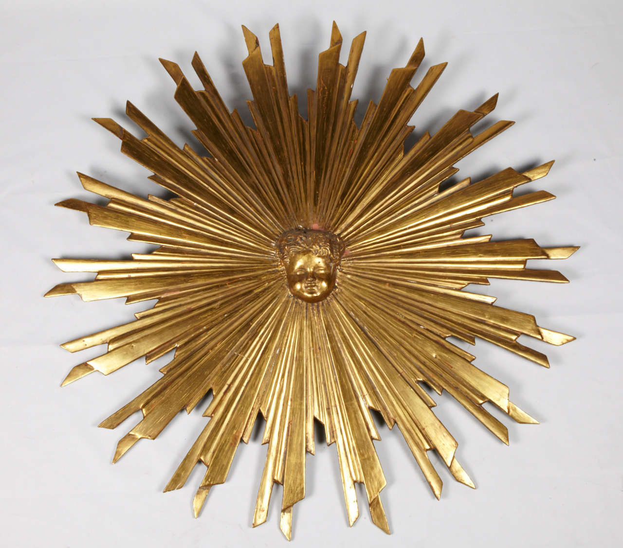 Gilt Carved Wood Sun with Angel Face in the Middle at 1stDibs