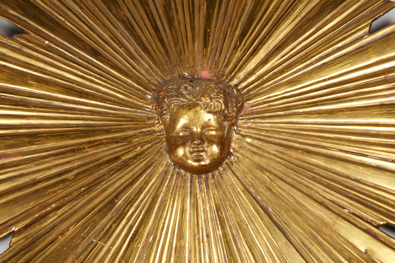 Gilt Carved Wood Sun with Angel Face in the Middle at 1stDibs