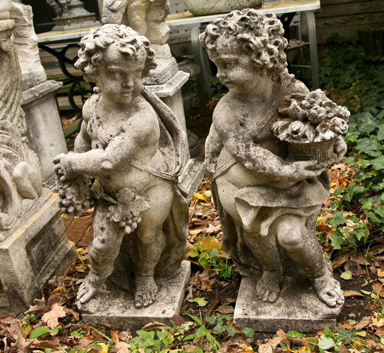 Pair of Antique Limestone Garden Putti at 1stDibs