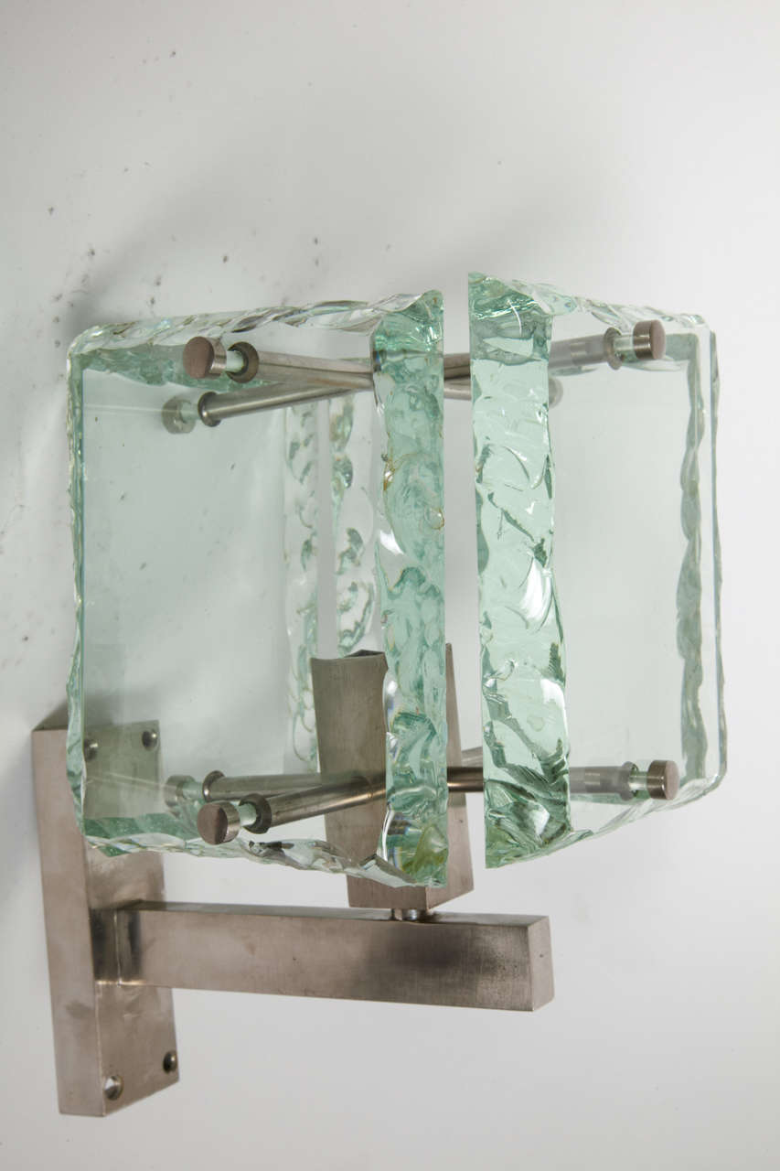 Pair of 1960's sconces in the manner of Max Ingrand at 1stDibs
