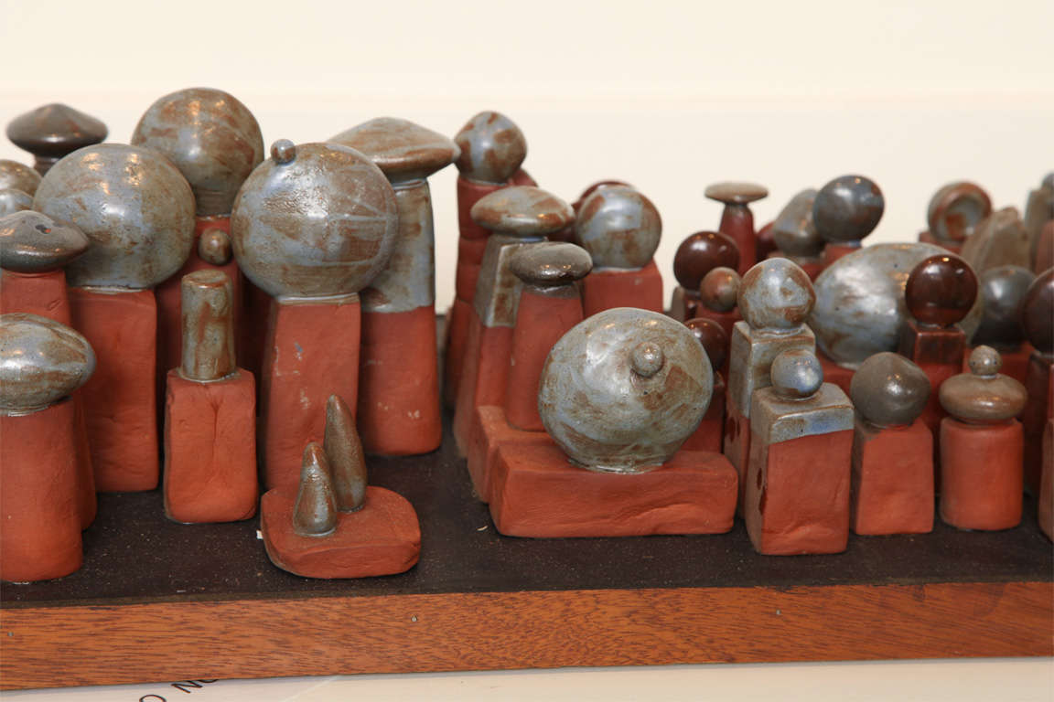 Ceramic City Skyline Sculpture on Wall-Mounted Platform at 1stDibs
