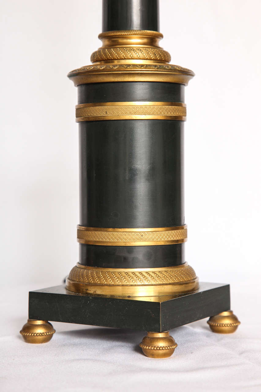 Pair of Gilt and Patinated Metal Banded Column Lamps For Sale at 1stdibs