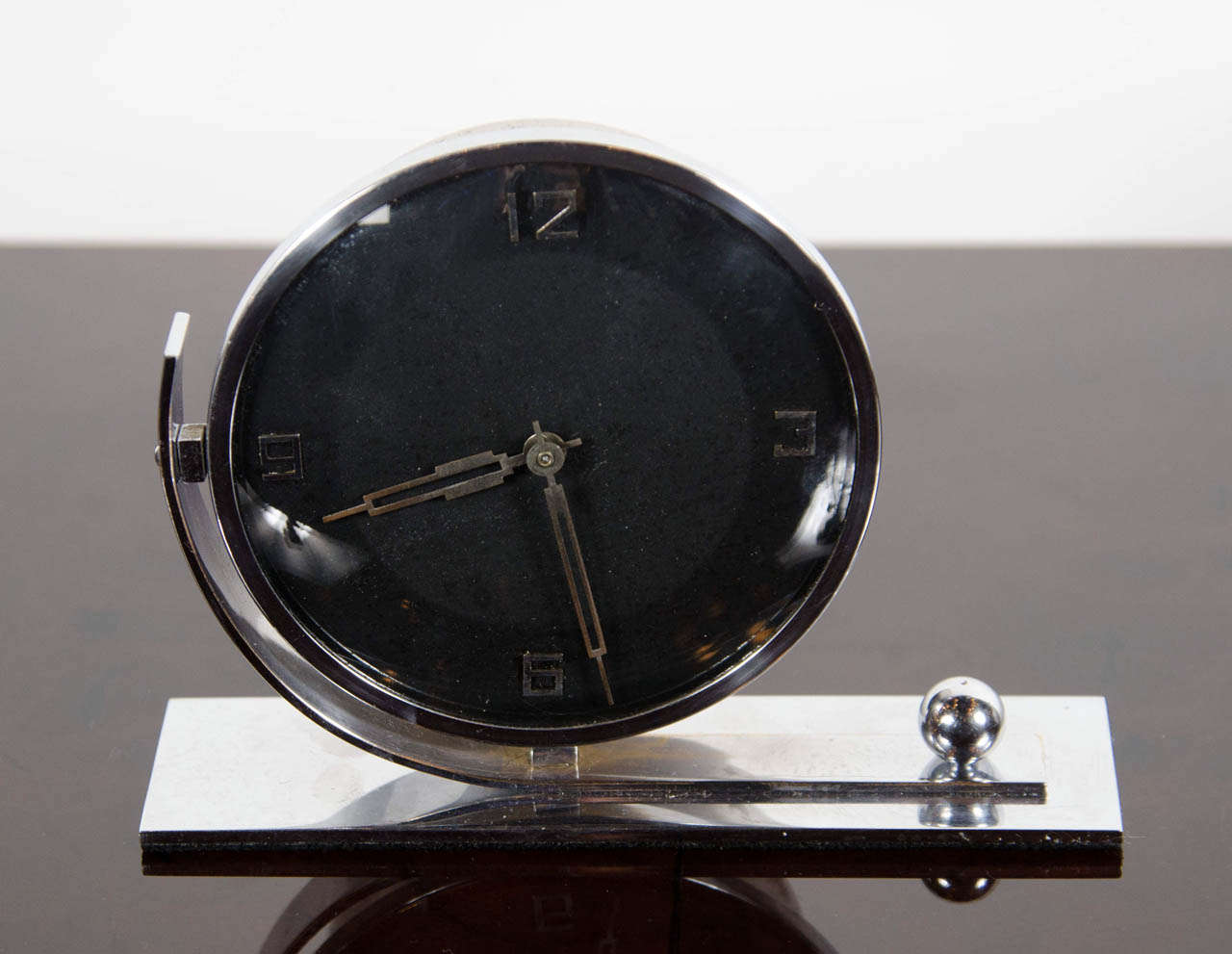 Streamline Art Deco Clock with Circular Face and Chromed Accents at ...