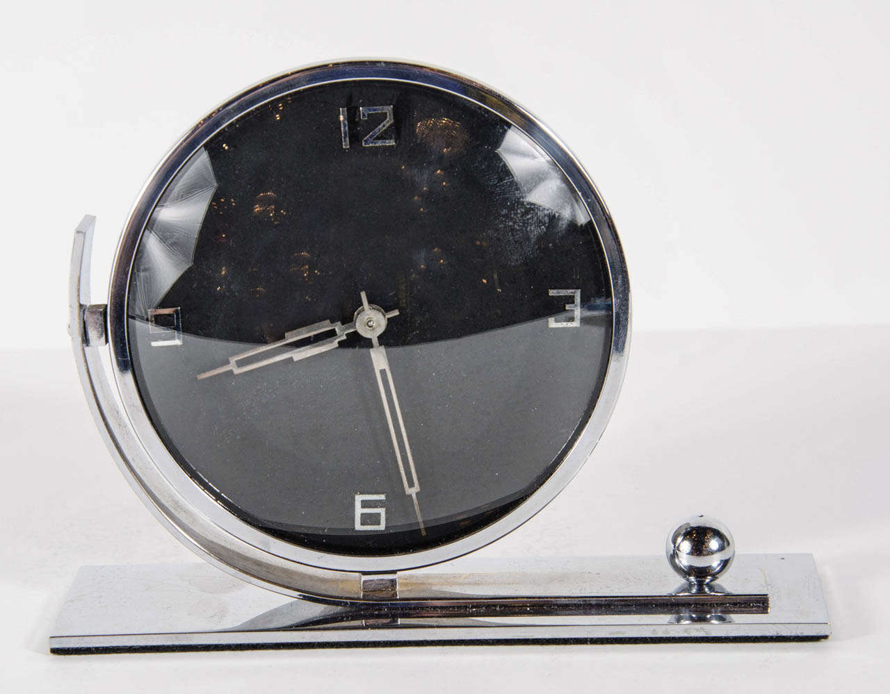 Streamline Art Deco Clock with Circular Face and Chromed Accents at ...