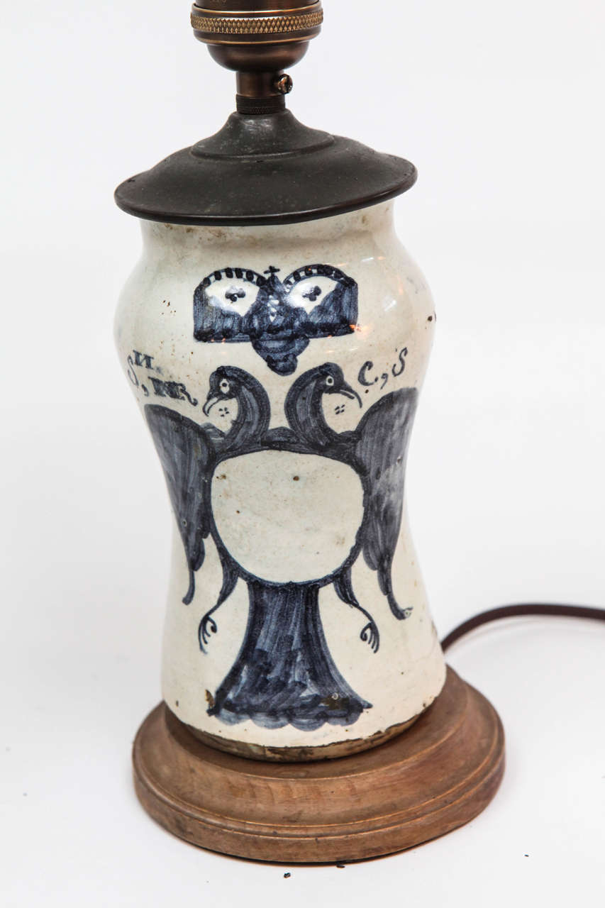 A rare pair of Mexican Talavera Albarello jars, mounted as lamps at ...