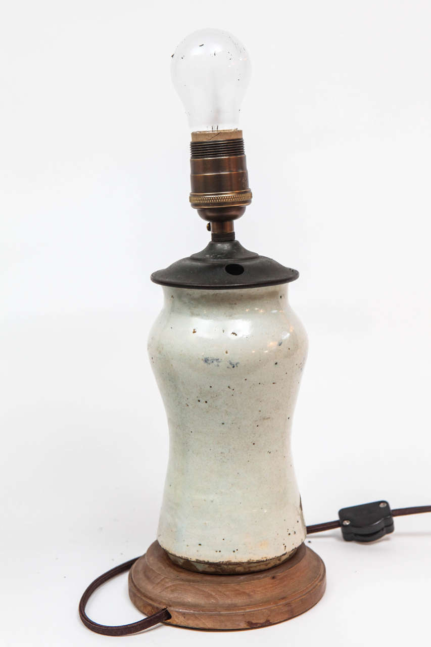 A rare pair of Mexican Talavera Albarello jars, mounted as lamps at ...