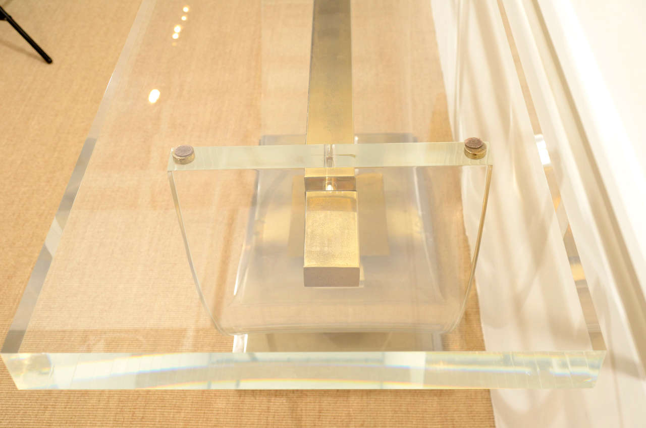 A French Lucite and Brass Console. at 1stDibs