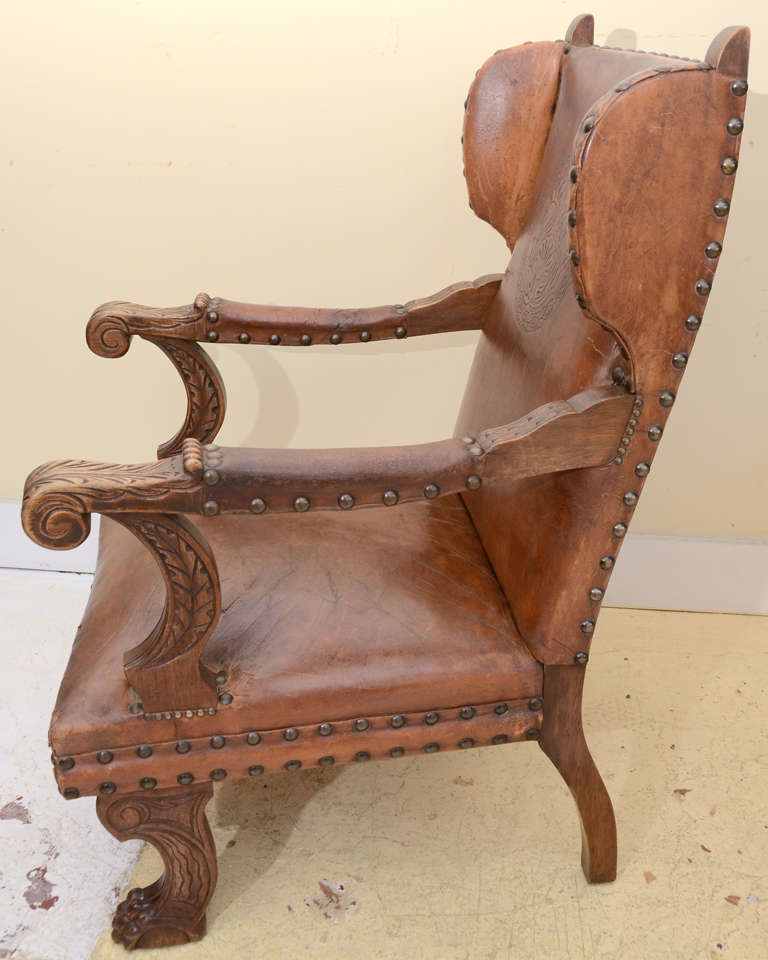 Dutch Embossed Dolphin Design Open Arm Wing Chair at 1stDibs
