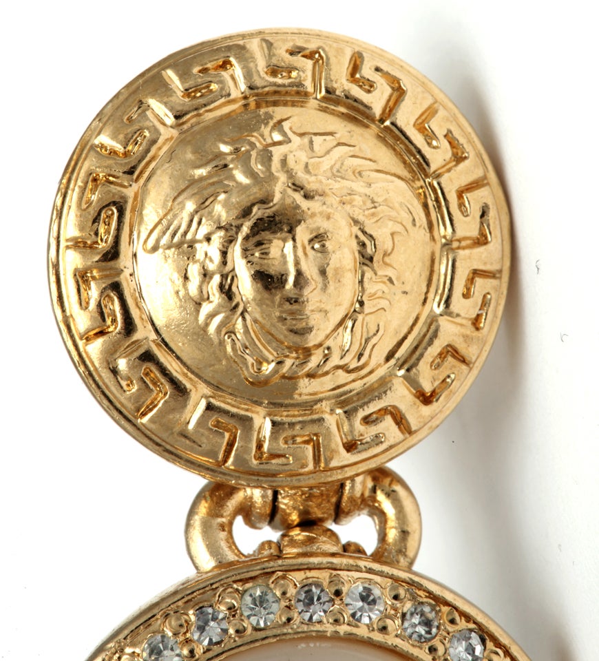 Gianni Versace white and gold dangling earrings with Medusa motifs at ...