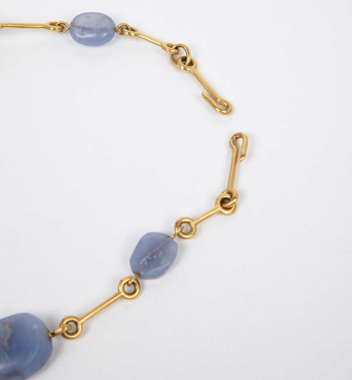 Antique Ribbon Agate Winged Bead And Gold Necklace at 1stDibs