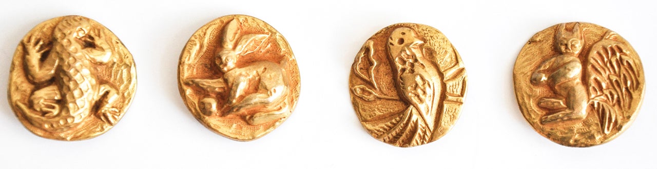 Set of Four Line Vautrin Gilt Bronze Buttons at 1stDibs