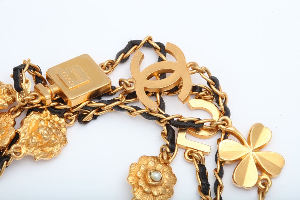Chanel Iconic Motif Charm and Leather Long Necklace at 1stDibs