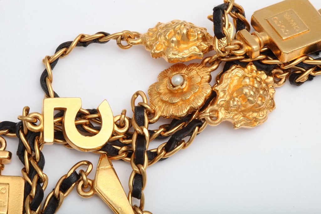 Chanel Iconic Motif Charm and Leather Long Necklace at 1stDibs