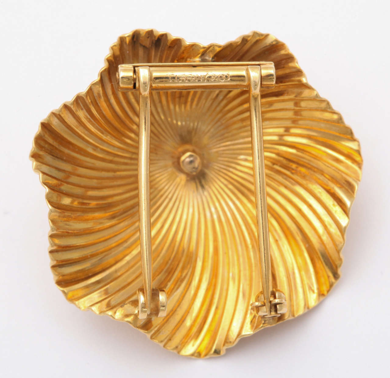 Tiffany Asymmetric Swirl Brooch with Ruby and Diamond Center at 1stDibs