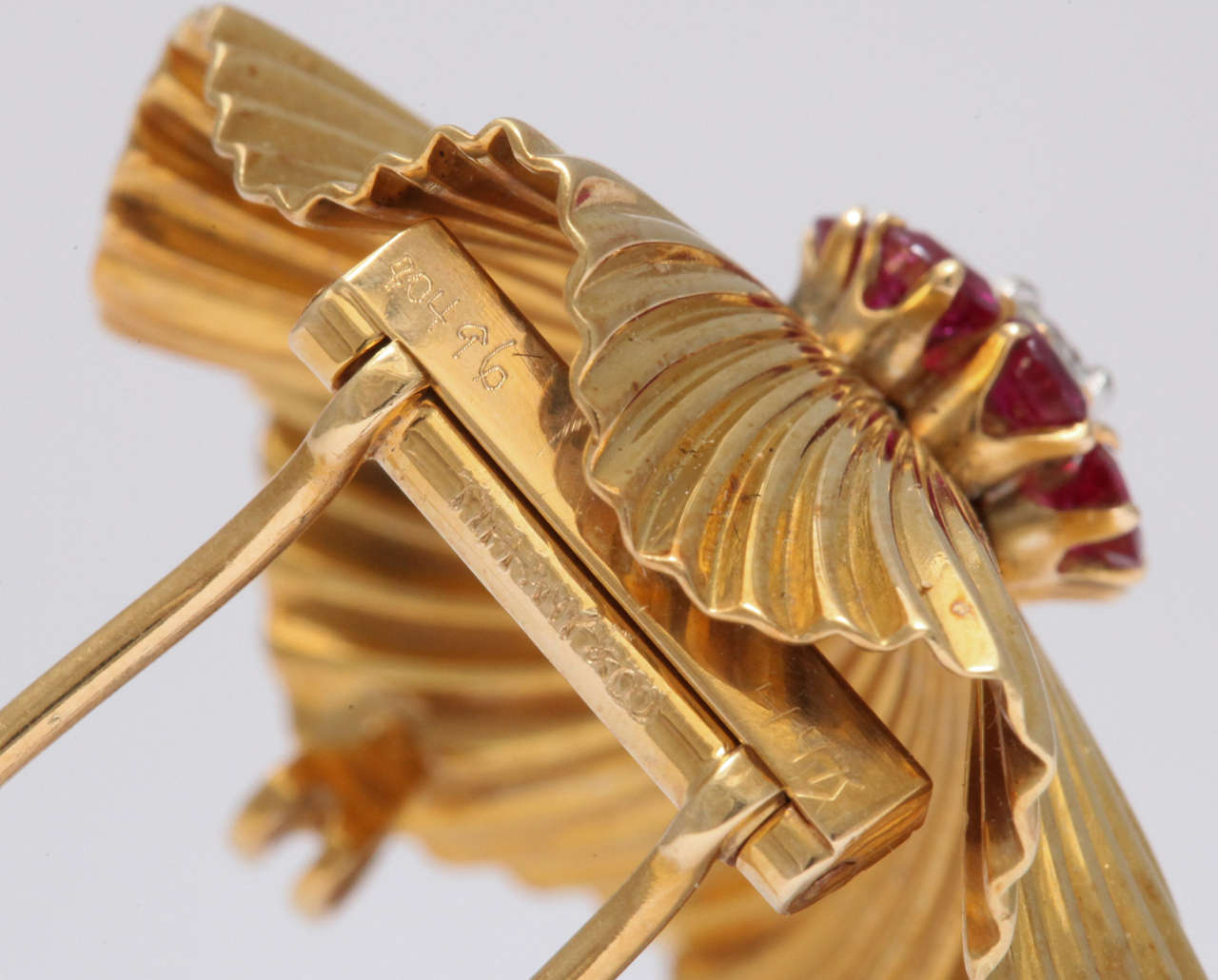 Tiffany Asymmetric Swirl Brooch with Ruby and Diamond Center at 1stDibs