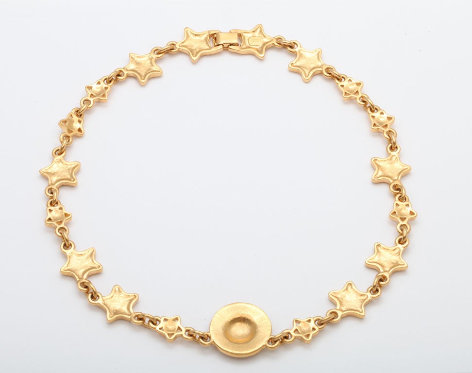 GIANNI VERSACE STAR AND MEDUSA NECKLACE at 1stDibs