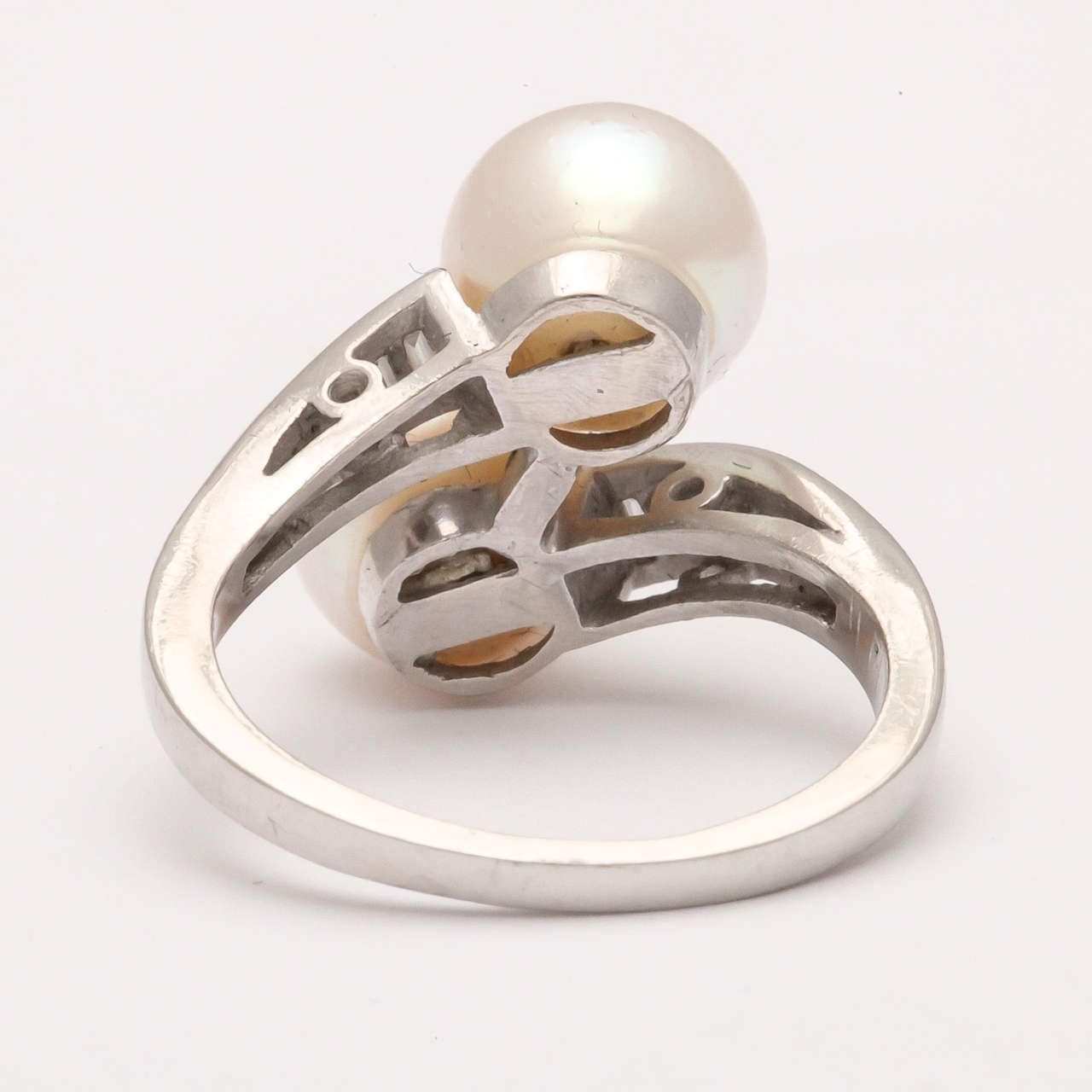 Pearl Graduated Diamond Crossover Baguette Ring For Sale at 1stDibs ...