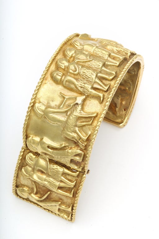 Large Gold Ancient Egypt Motif Bangle For Sale at 1stDibs