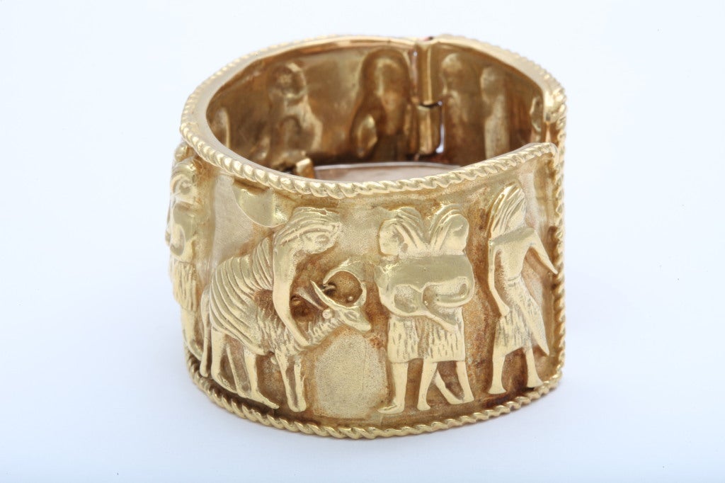 Large Gold Ancient Egypt Motif Bangle For Sale at 1stDibs