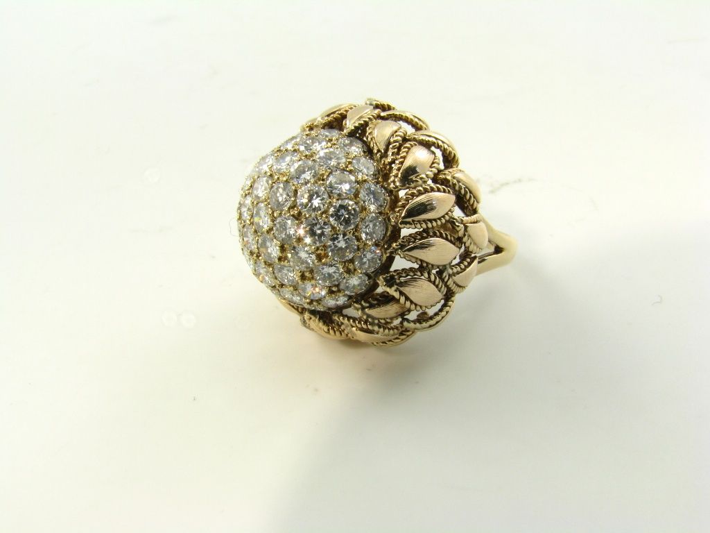 A chic yellow gold and diamond bombe' style dome ring at 1stDibs