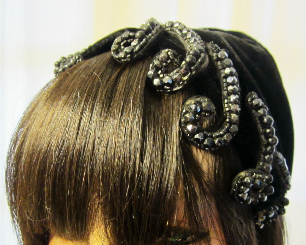 Close-Fitting Black Velvet Hat with Beaded Curls on Either Side at 1stDibs
